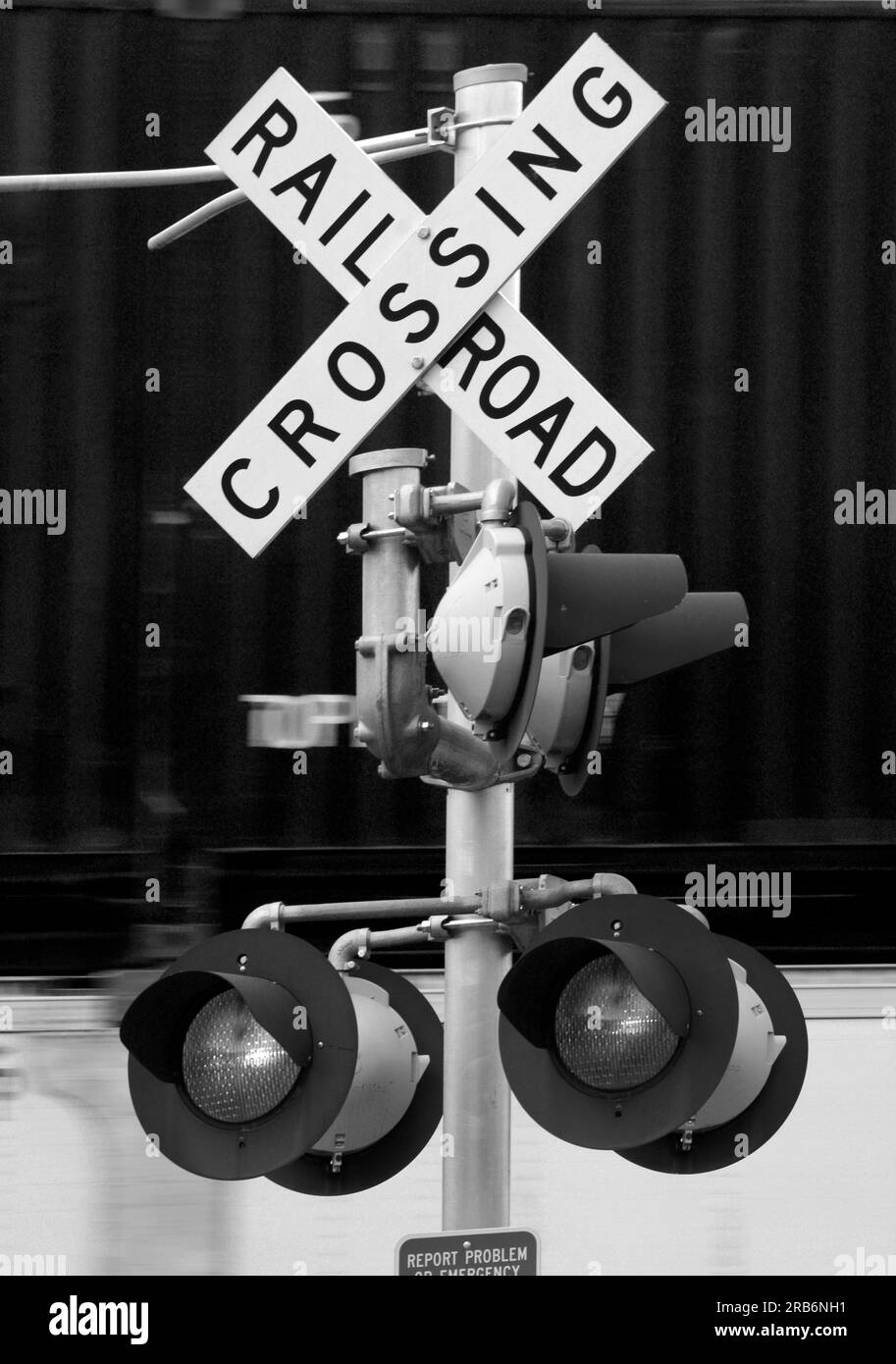 A freight train travels past a highway railroad crossing in Abingdon ...