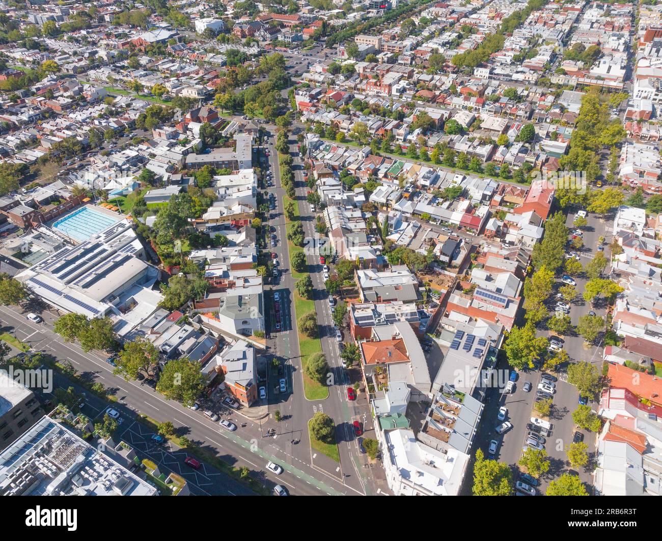 Aerial view of a city suburb with with well planned streets and ...