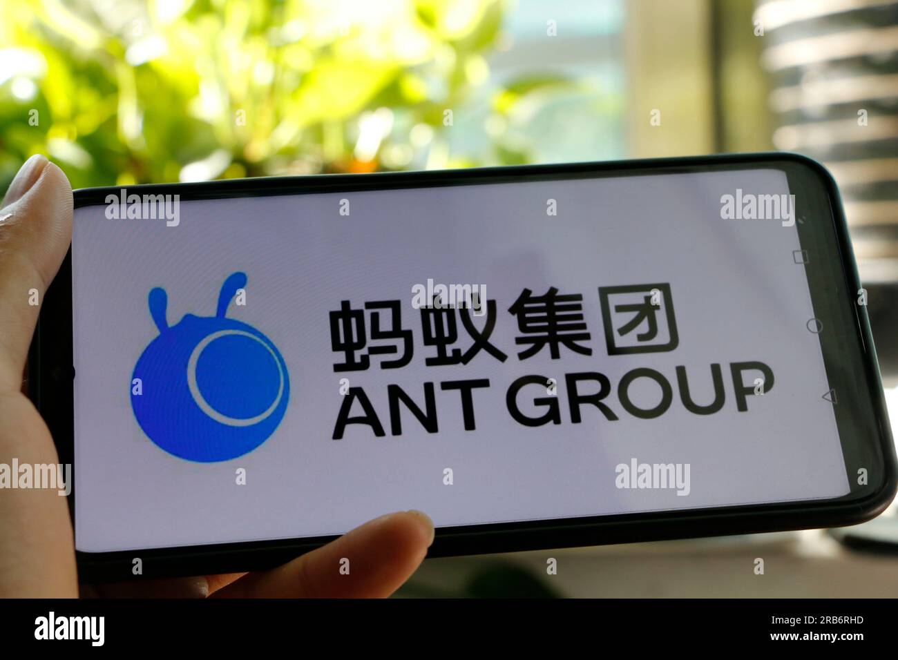 BEIJING, CHINA - JULY 8, 2023 - A citizen checks the logo of Ant Group ...