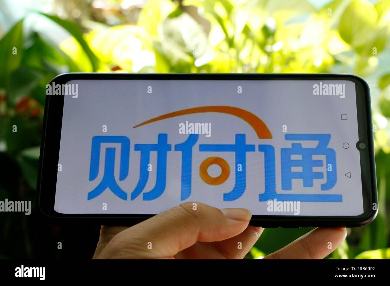 BEIJING, CHINA - JULY 8, 2023 - A citizen checks a Tenpay logo in ...