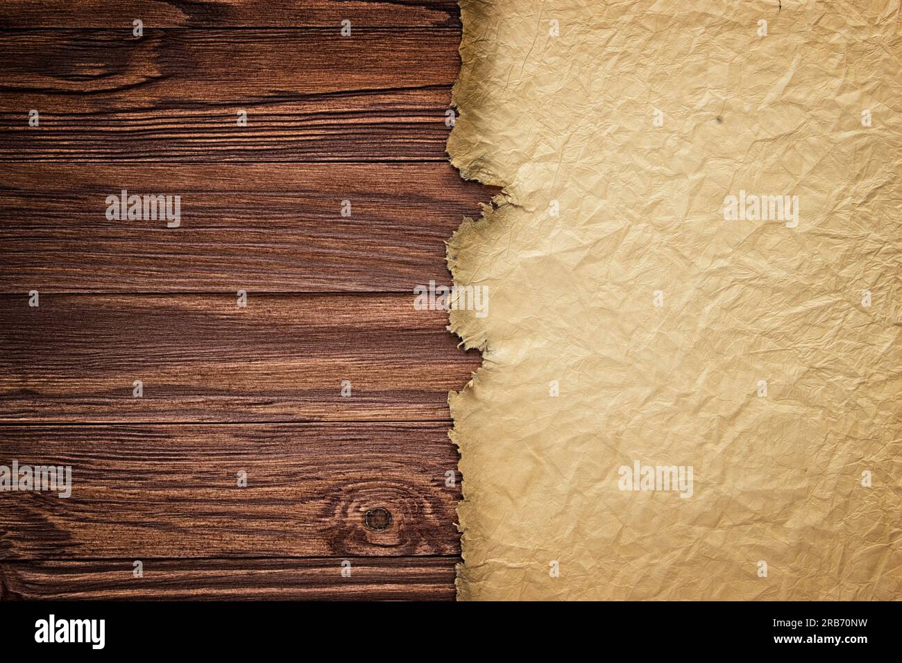 Old paper on the wood background, ancient scroll Stock Photo - Alamy