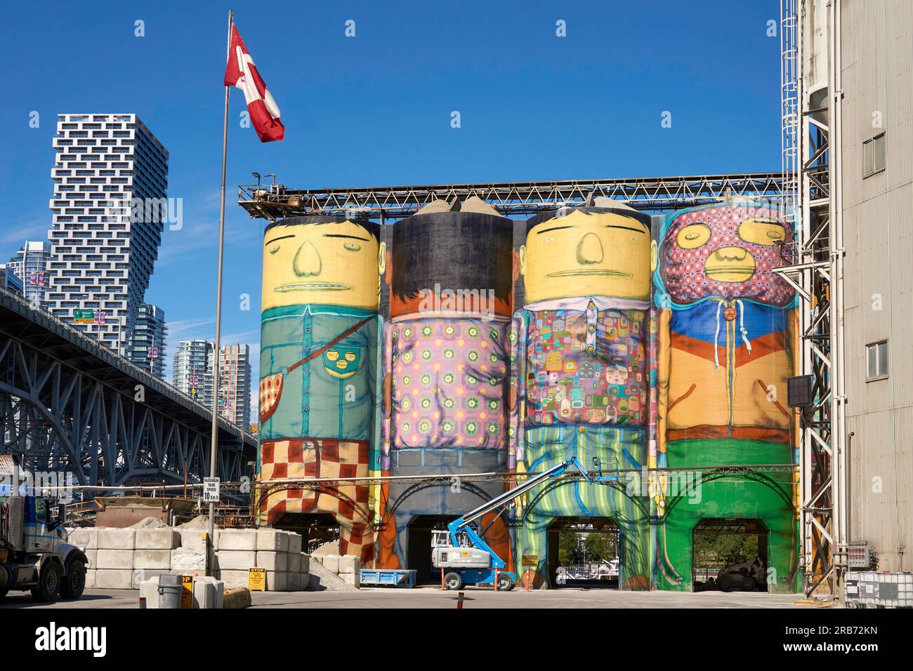 Giants painted by OSGEMEOS on silos at Ocean Concrete on Granville ...