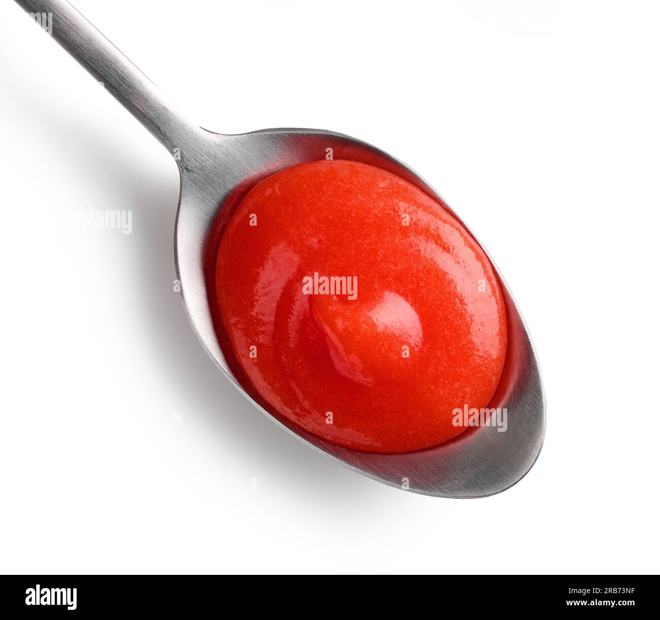 spoon of tomato puree ketchup isolated on white background, top view ...
