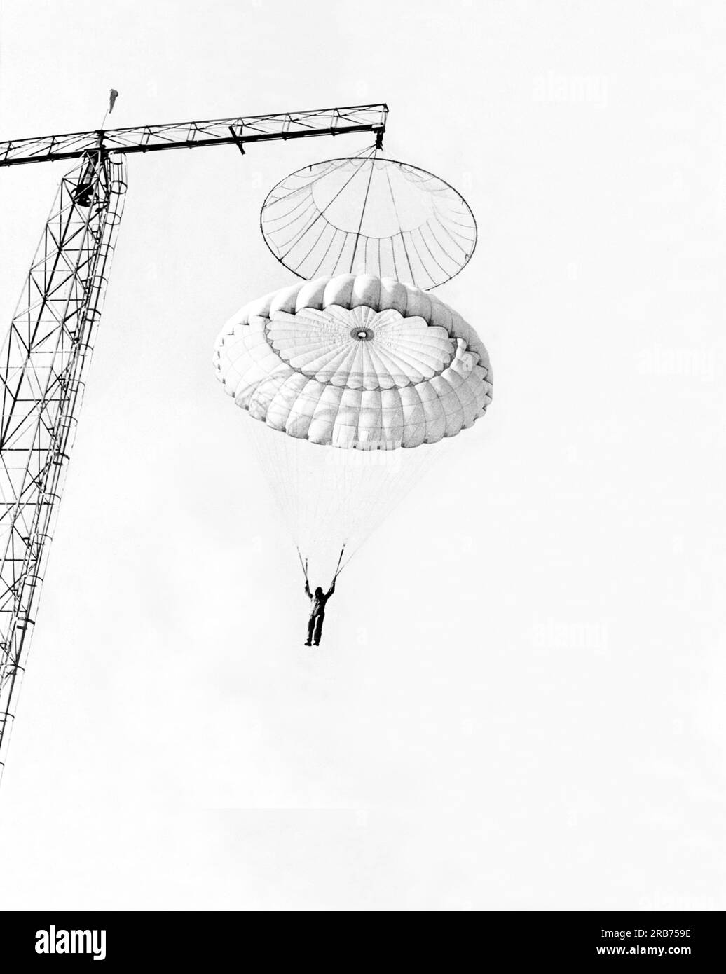 United States: c. 1957 A Marine falling free from the Flyaway Tower at ...