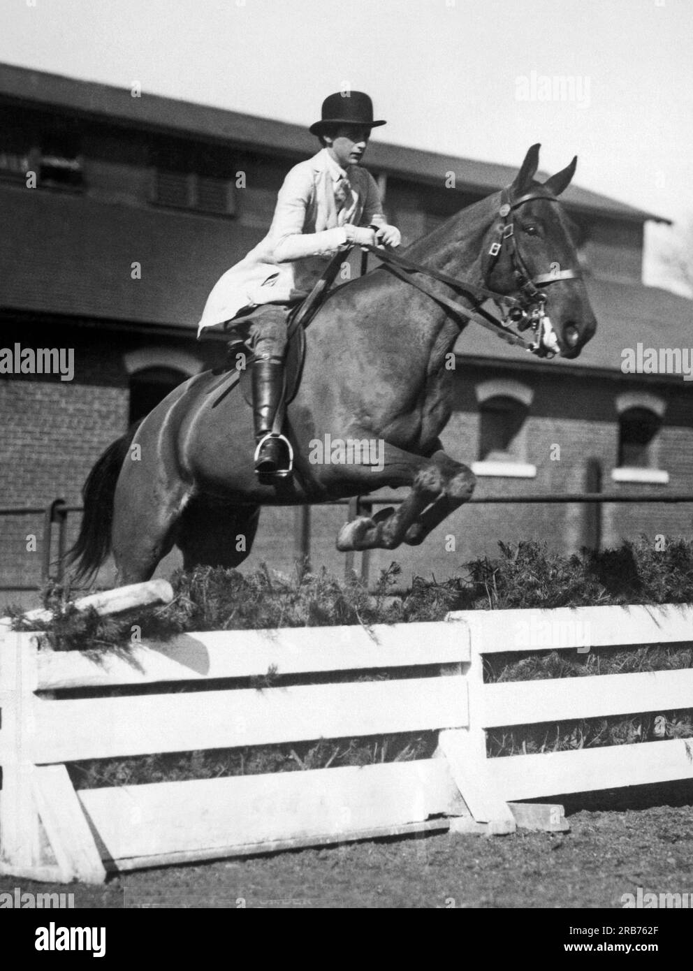 Washington, D.C.: March 17, 1927. Mlle. Helen Heilman puts her mount ...