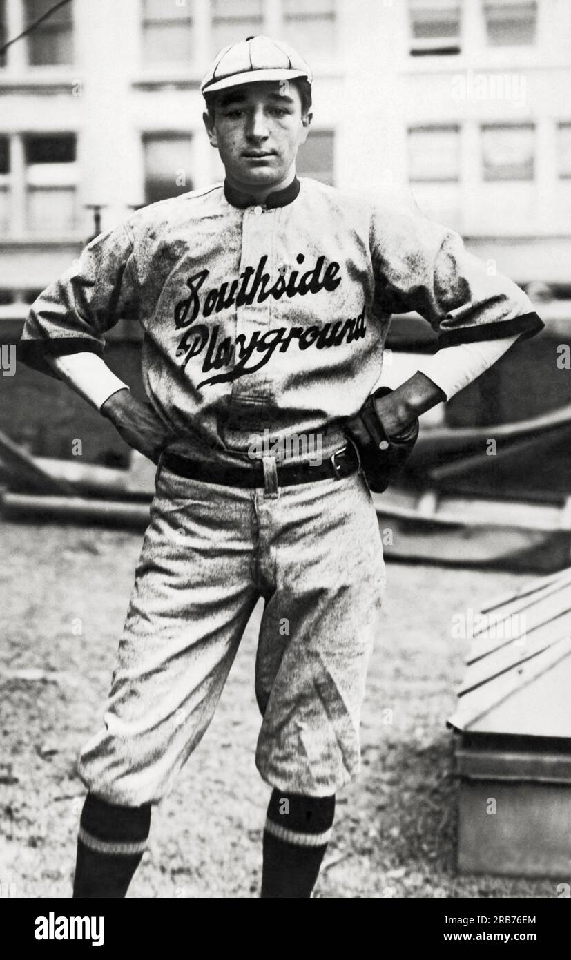 United States: c. 1910 A baseball player for the Southside Playground ...