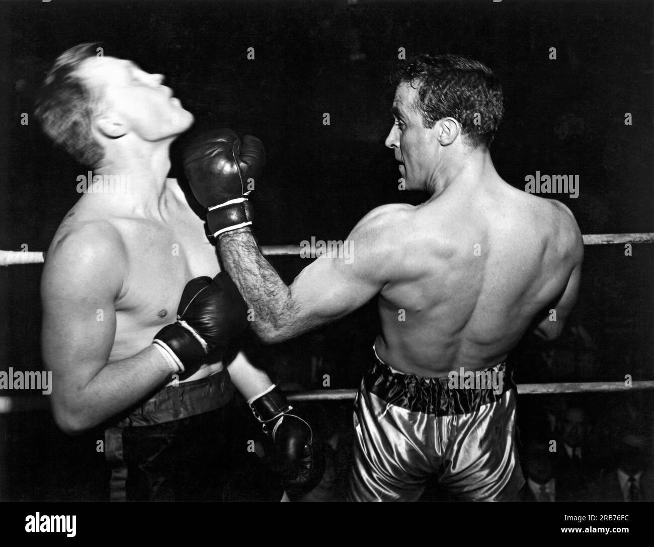 United States: c. 1953. A boxer greets his opponent with a sharp ...