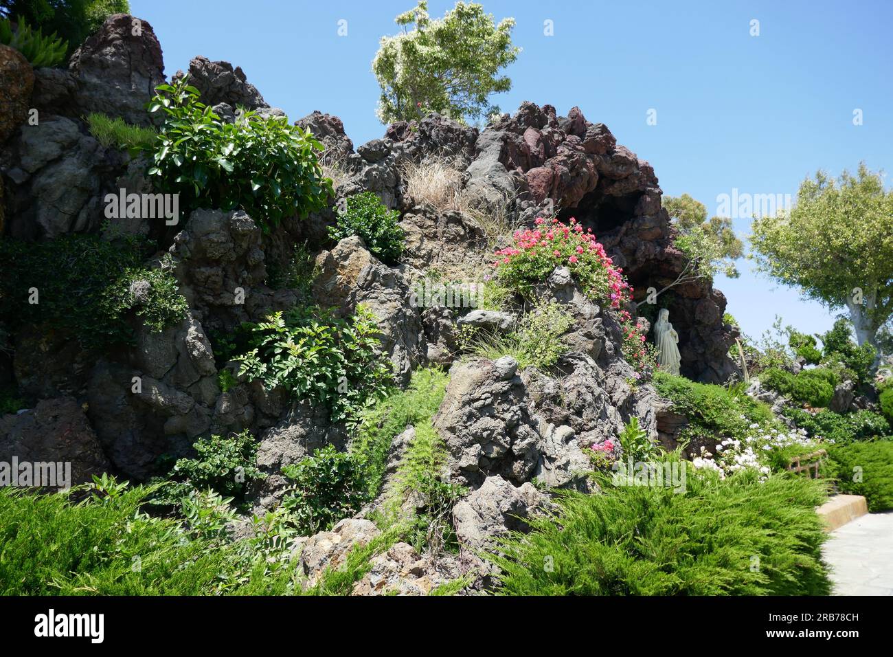 Grotto of holy cross cemetery hi-res stock photography and images - Alamy