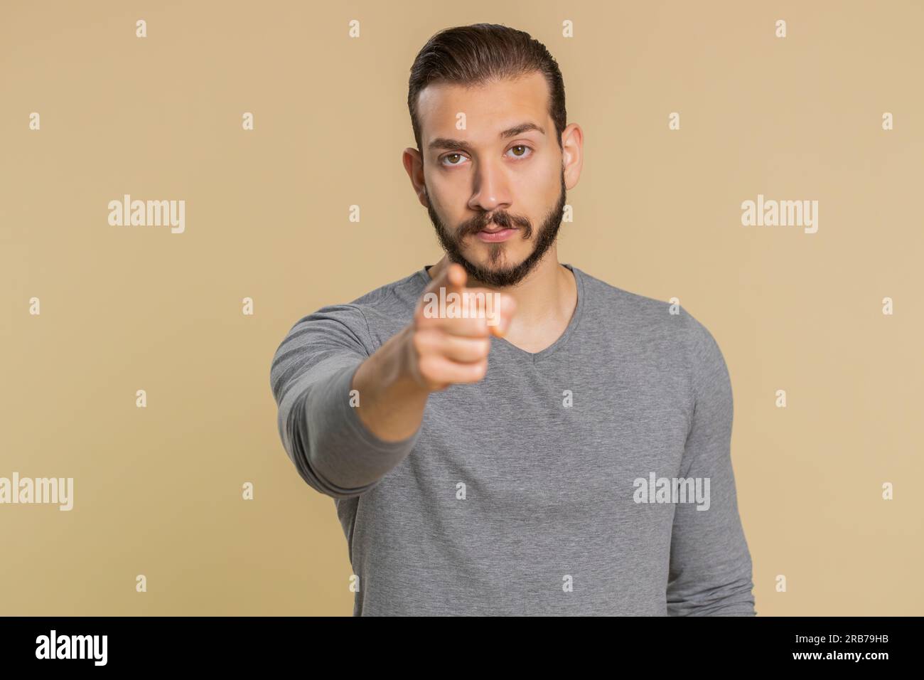 Quarrel. Displeased young lebanese man gesturing hands with irritation ...