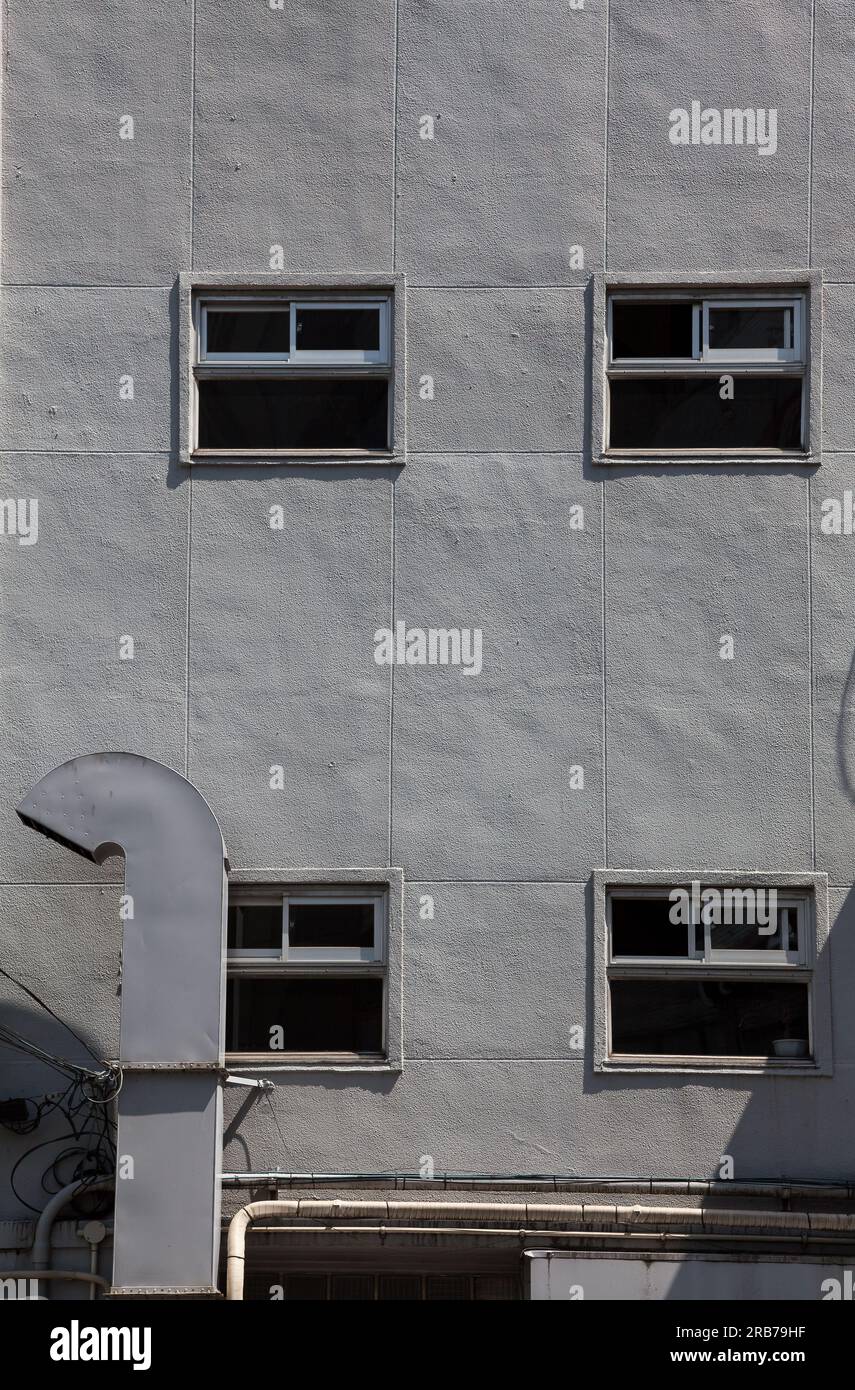 Windows and air-conditioning vents on a building in Ebisu, Tokyo, Japan ...