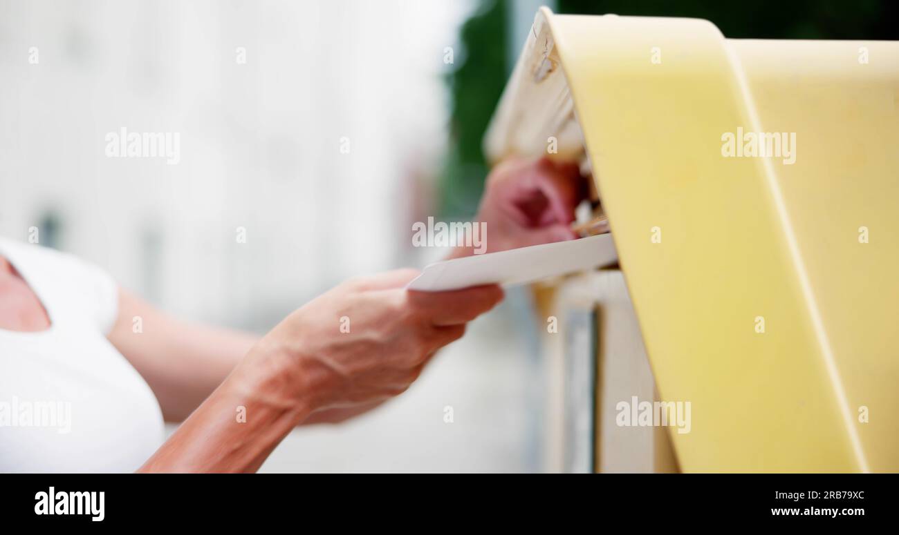Postbox Envelope Mail Delivery. Inserting Letter In Mailbox Stock Photo ...