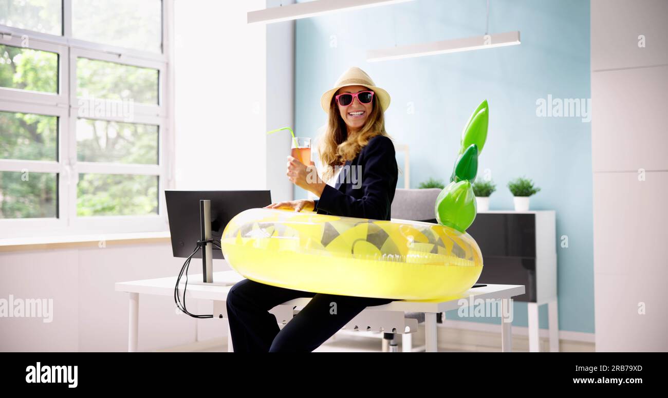 Funny Summer Vacation In Office. Employee Holiday Stock Photo - Alamy