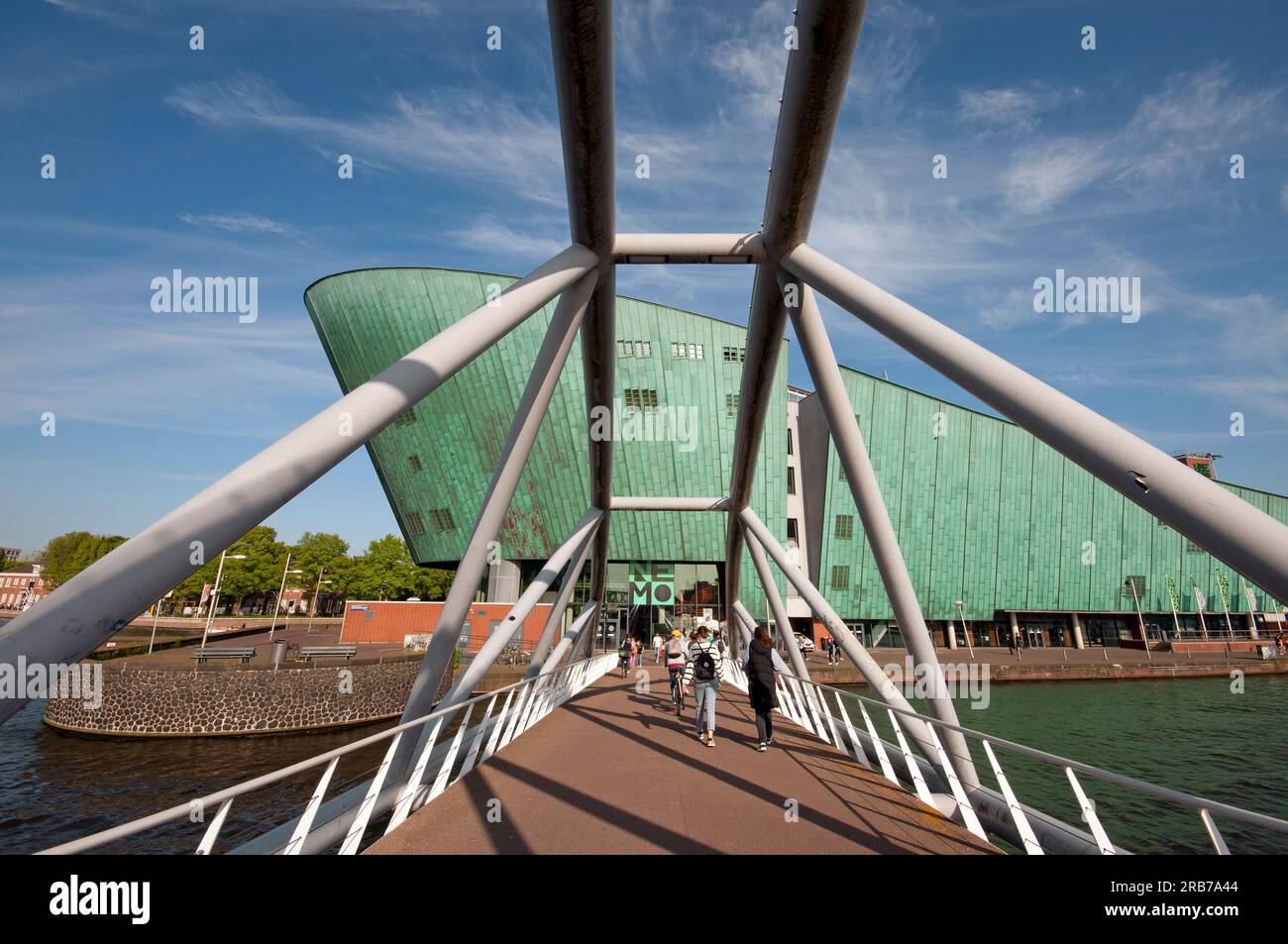 Metal bridge leading to Nemo Science Museum (the boat-shaped building ...