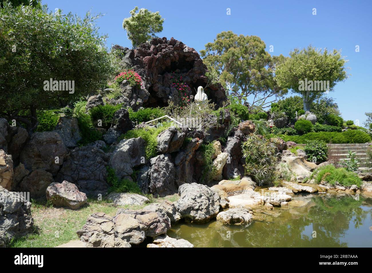 Grotto of holy cross cemetery hi-res stock photography and images - Alamy
