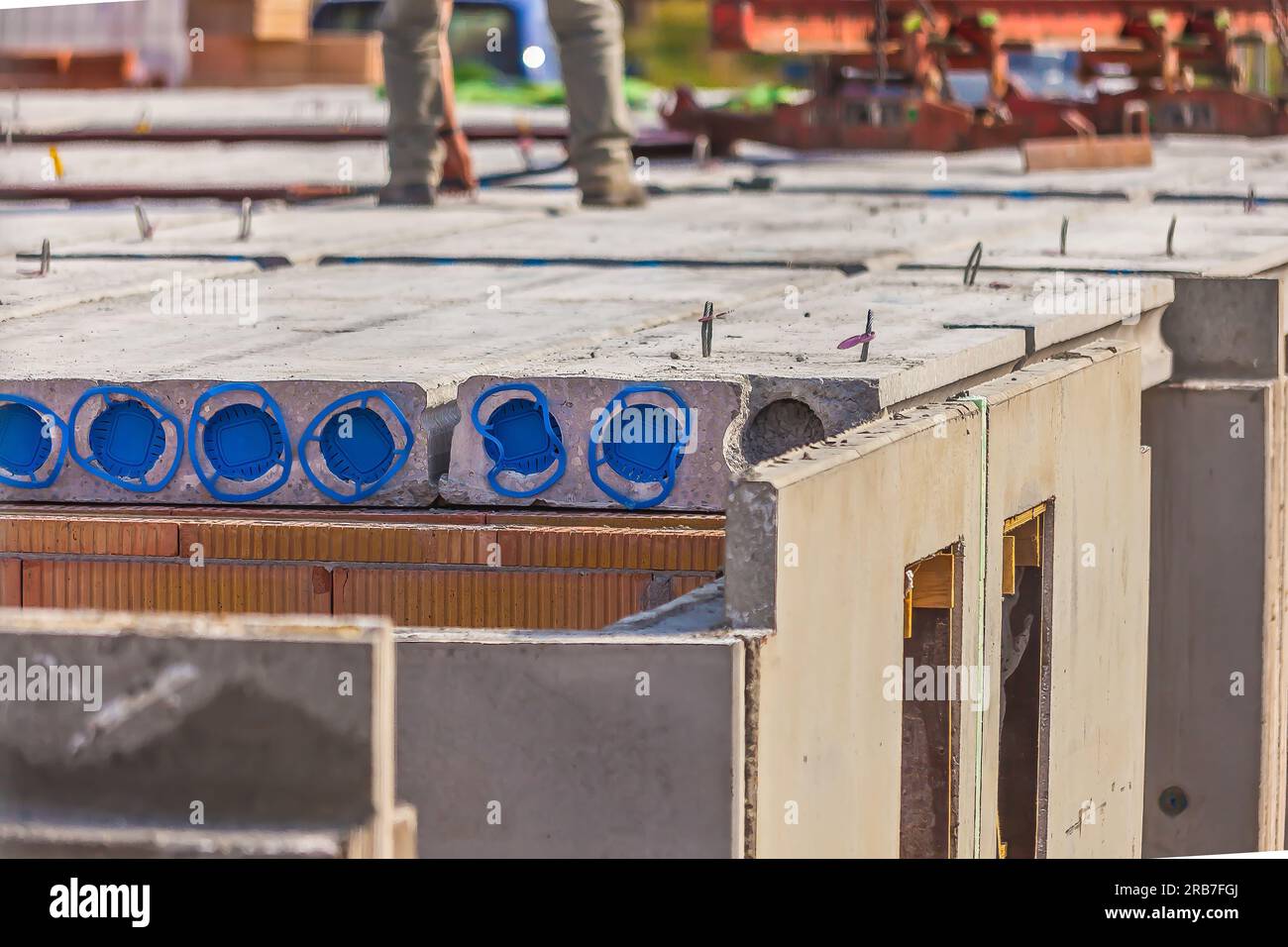 Picture of construction site with precast concrete walls and slabs in ...