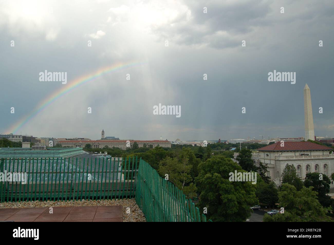 Rainbow in sky over Washington, D.C., viewed from Main Interior rooftop ...