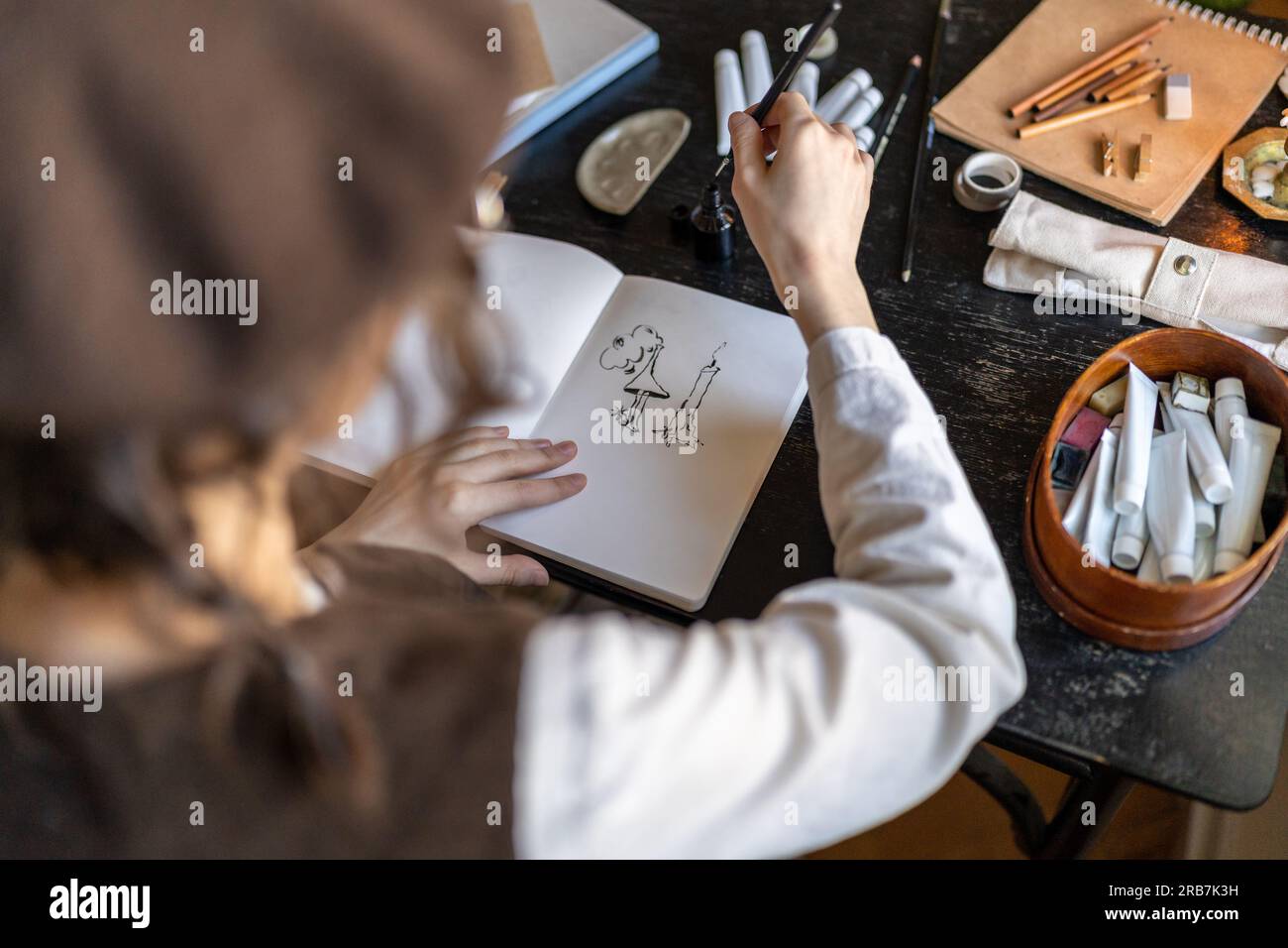 Creative hobby, profession. Illustrator hands artist drawing in ...