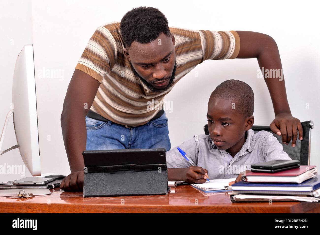 Father homework standing hi-res stock photography and images - Alamy