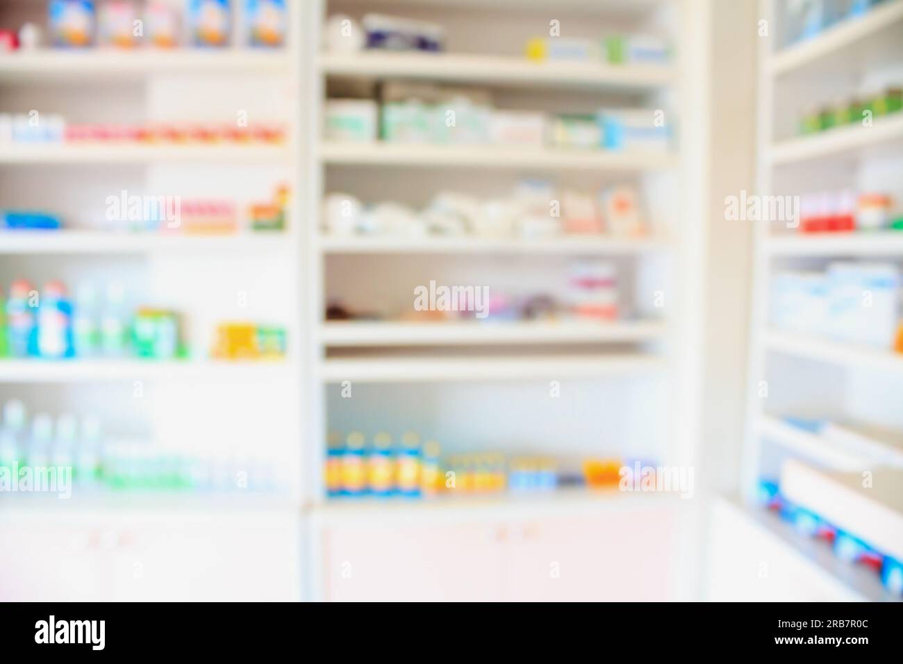 pharmacy shelves filled with medication blur background Stock Photo - Alamy
