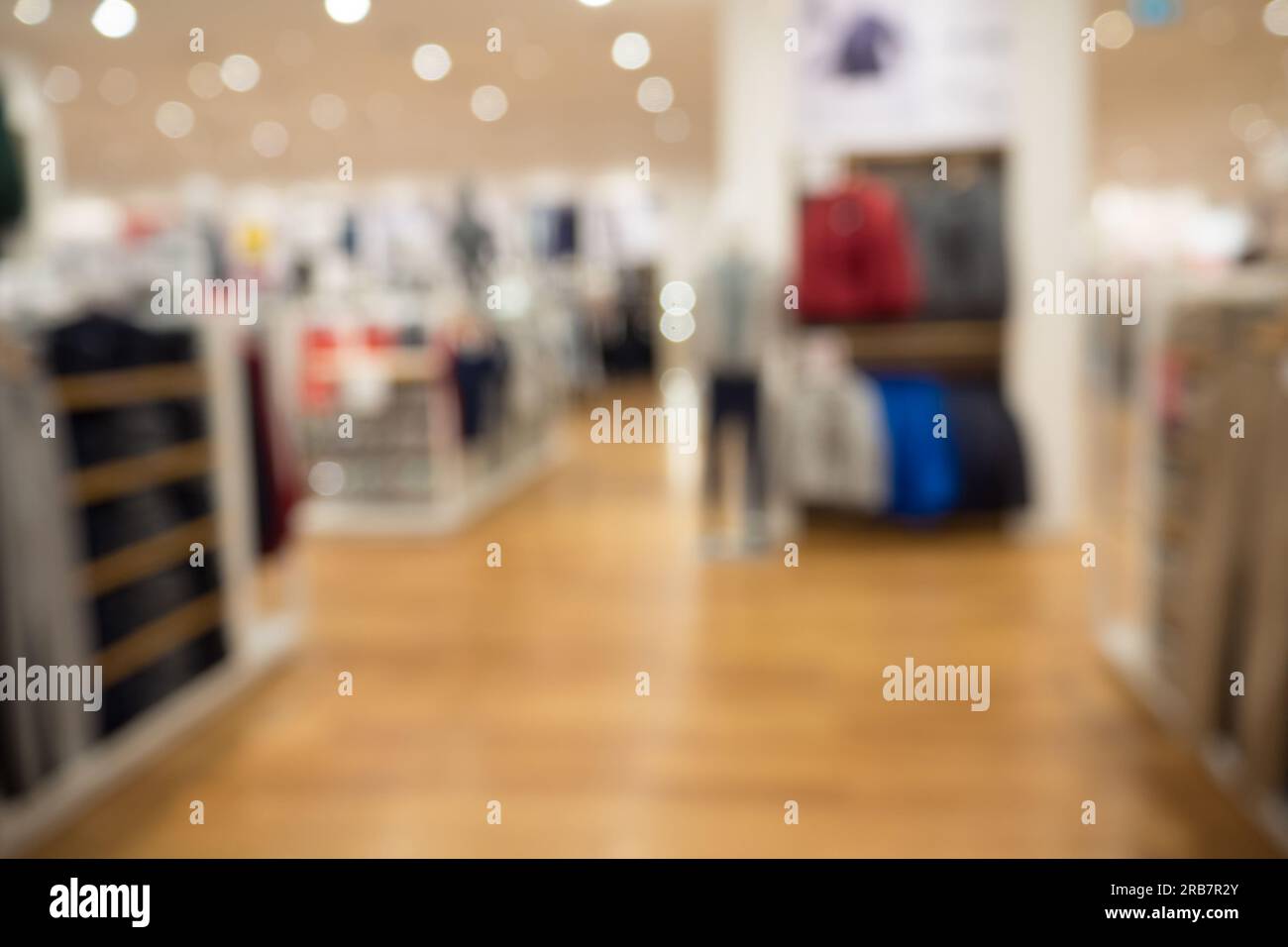 clothing store in shopping mall boutique shop interior blur defocused ...