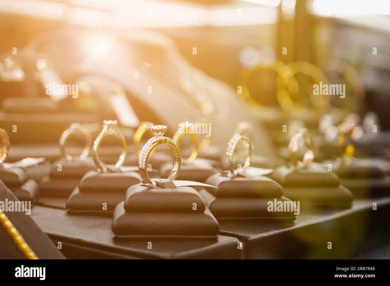 Jewelry diamond rings and necklaces show in luxury retail store window ...