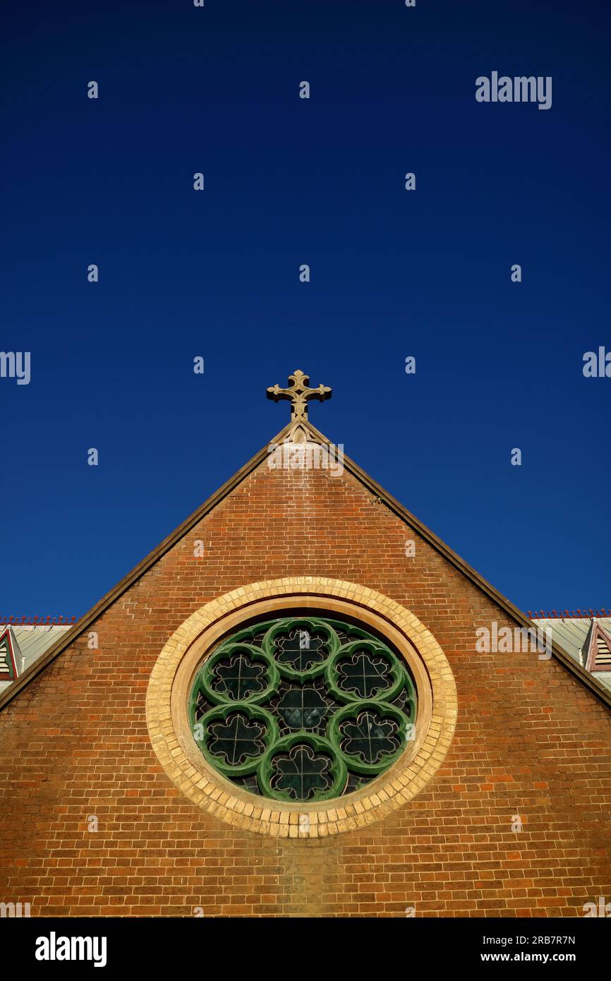 Church cross and circular window against clear blue sky Stock Photo - Alamy