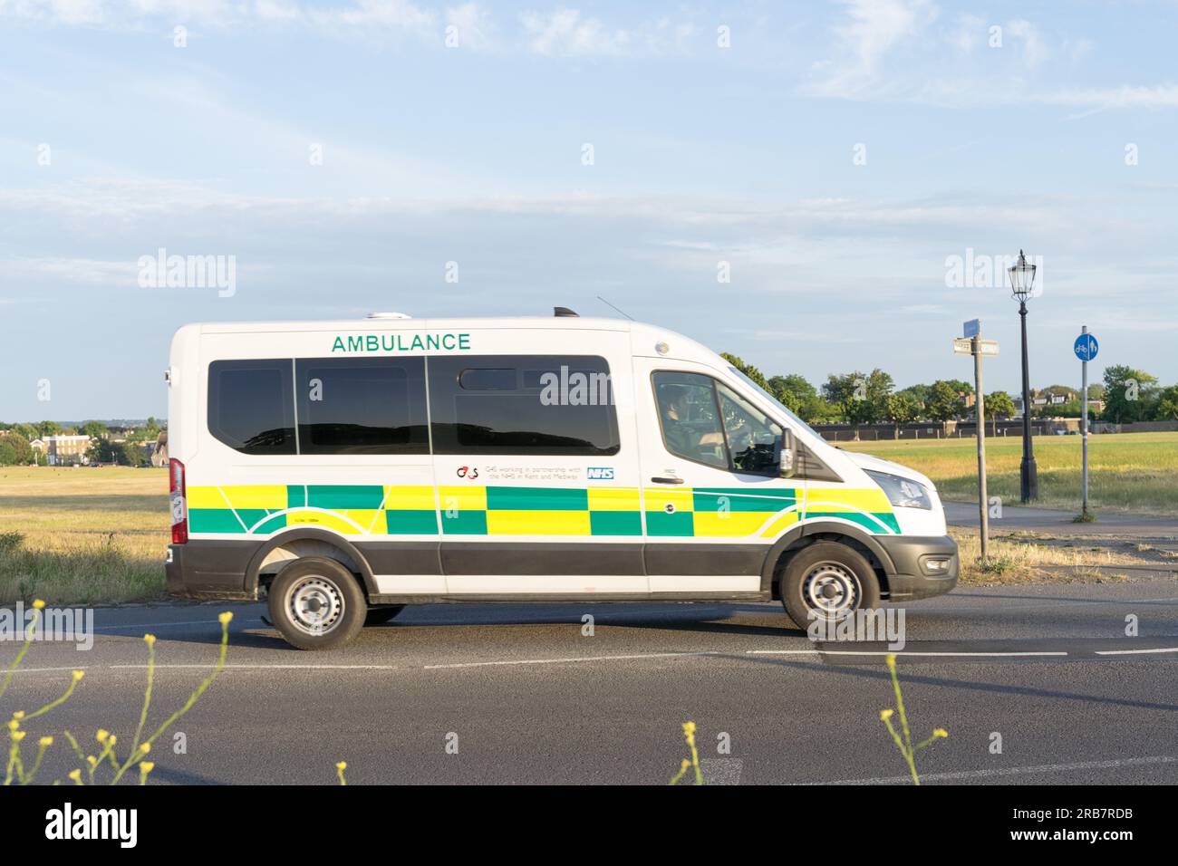 side view of an Emergency Ambulance on road in response to 999 calls ...
