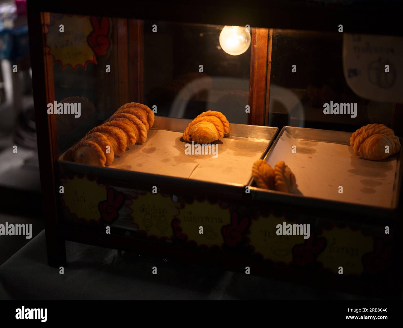 fried curry dumpling (with meat or vegetable snuffing) in display ...