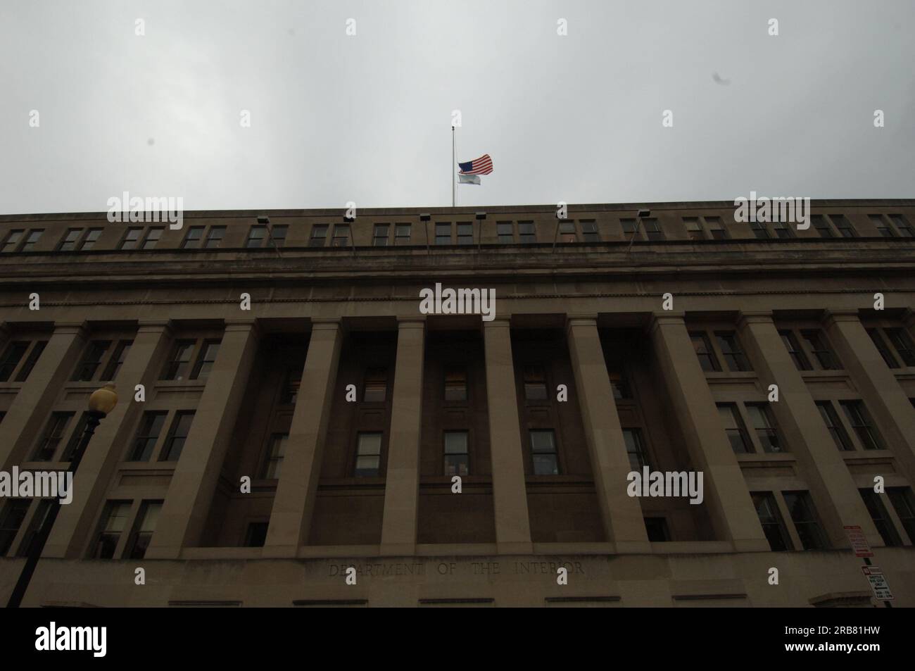 Views of the front of Main Interior Building, flag Stock Photo - Alamy