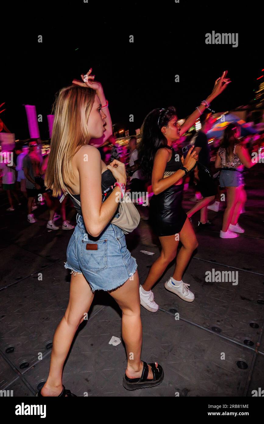 Guests attend Ultra Europe Music Festival as DJ Griffin performs on stage during first day of ...