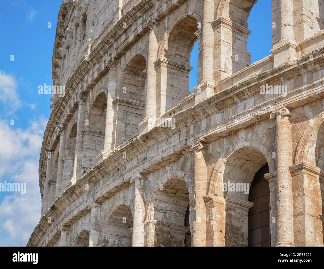 Part of the outer wall of the Colosseum with arched window openings in ...