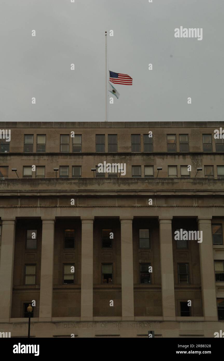 Views of the front of Main Interior Building, flag Stock Photo - Alamy