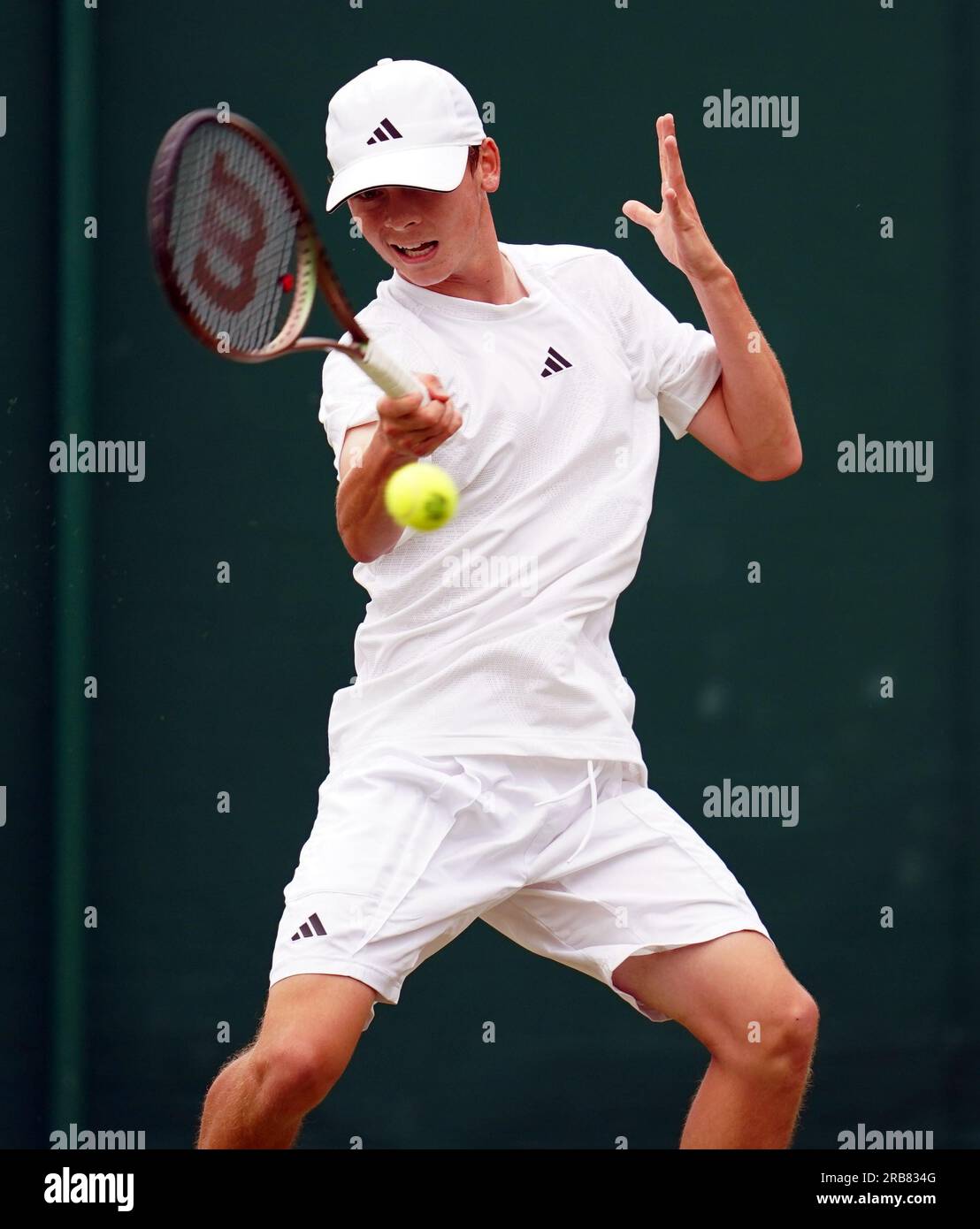 Charlie Robertson in action during his boys singles match on day six of ...