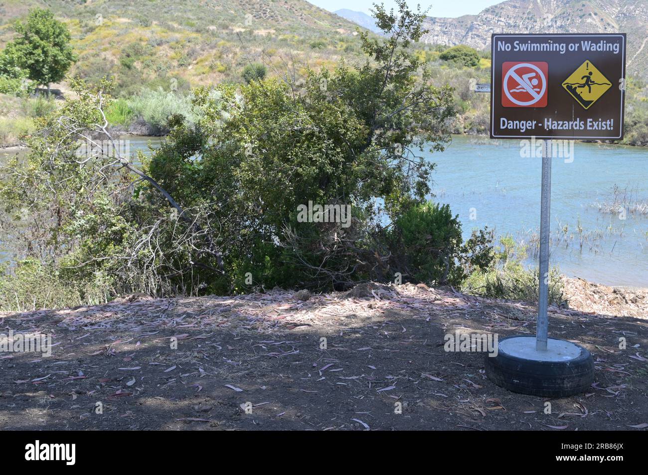 Warning sign at Lake Piru reservoir located in Los Padres National ...