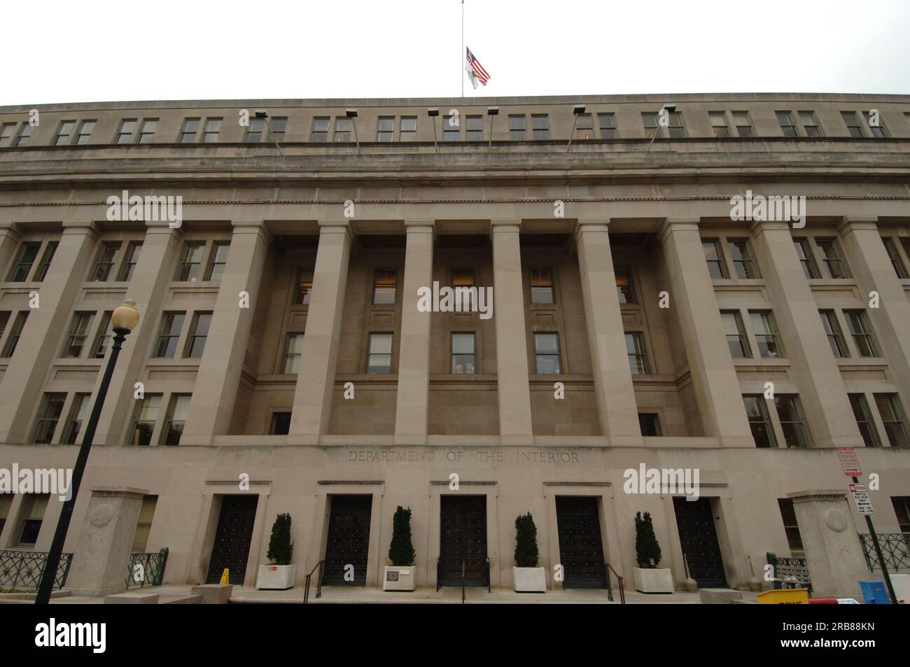 Views of the front of Main Interior Building, flag Stock Photo - Alamy