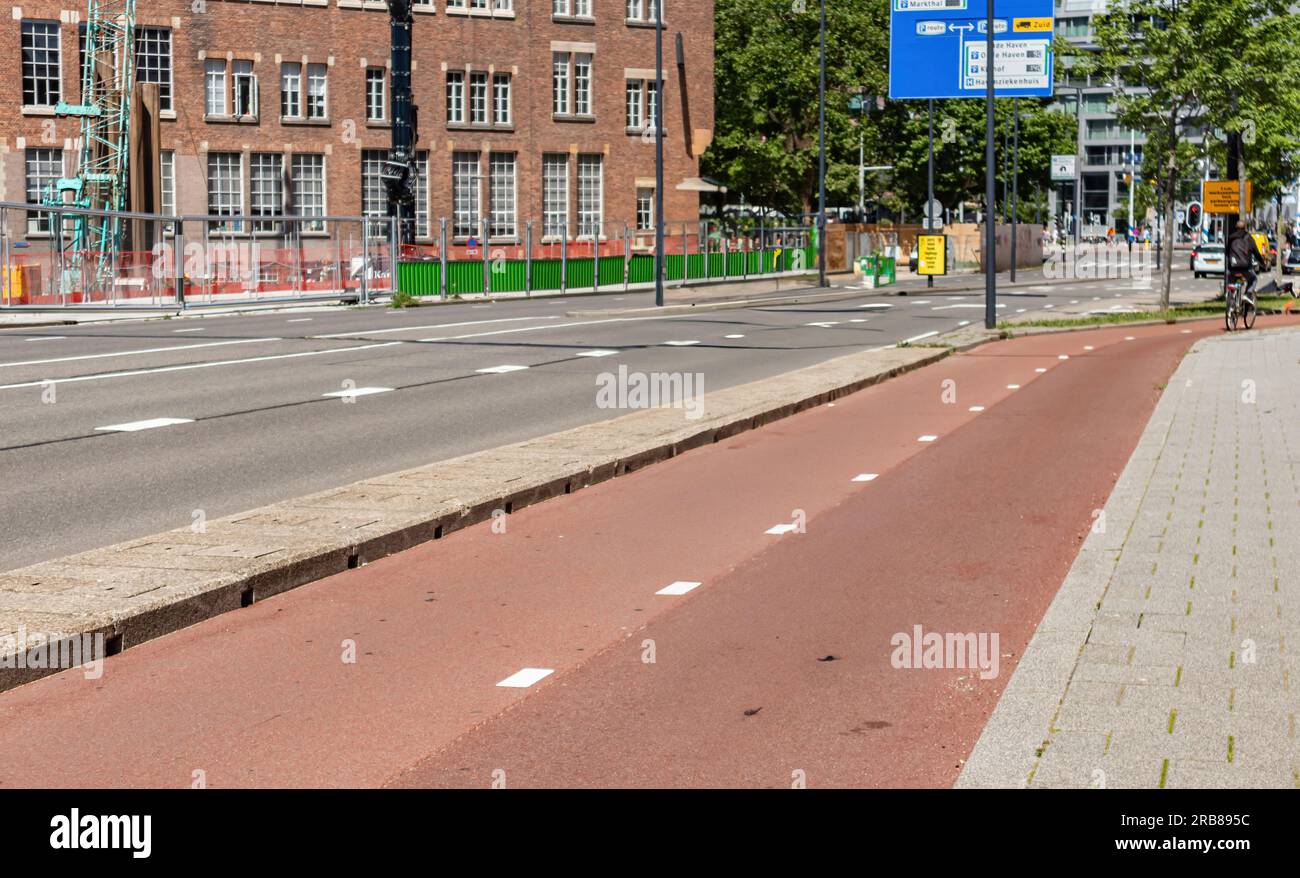 Safe transportation on bicycle lane at city center. Cyclist on cycle ...