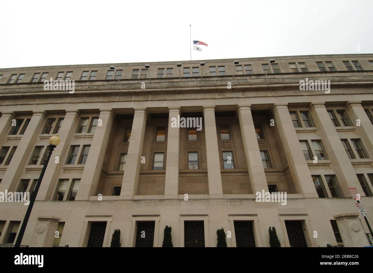 Views of the front of Main Interior Building, flag Stock Photo - Alamy