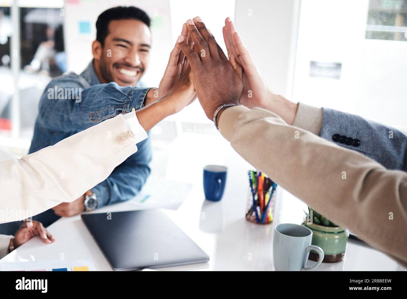 Creative people, meeting and high five for team building, success or ...