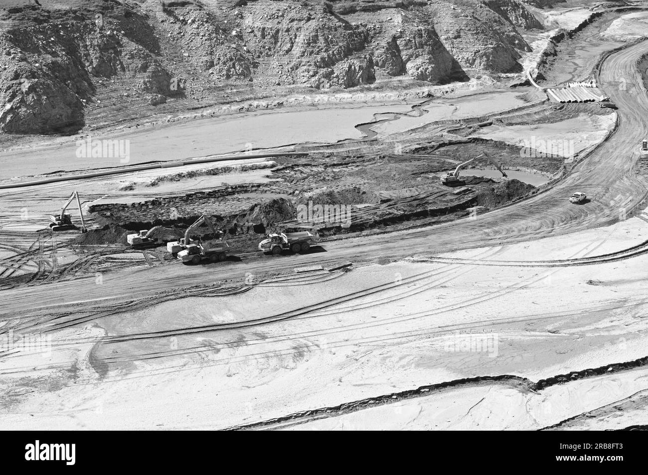 Heavy plant machinery removing silt from San Gabriel Reservoir No.1 in ...