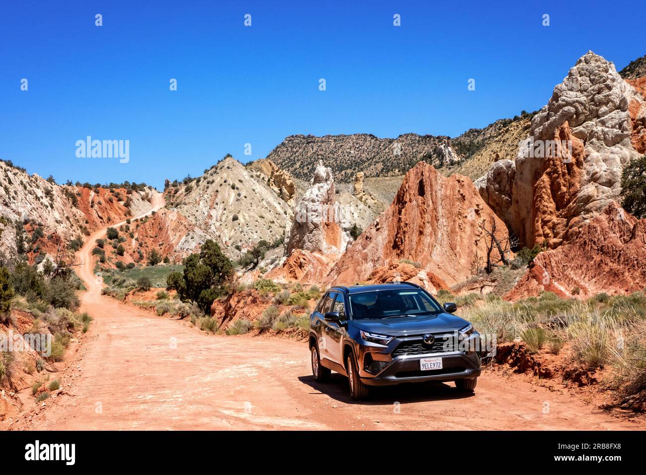 Toyota RAV 4 on the dirt road heading south to HWY 89 from Kodachrome Basin State park Utah usa ...