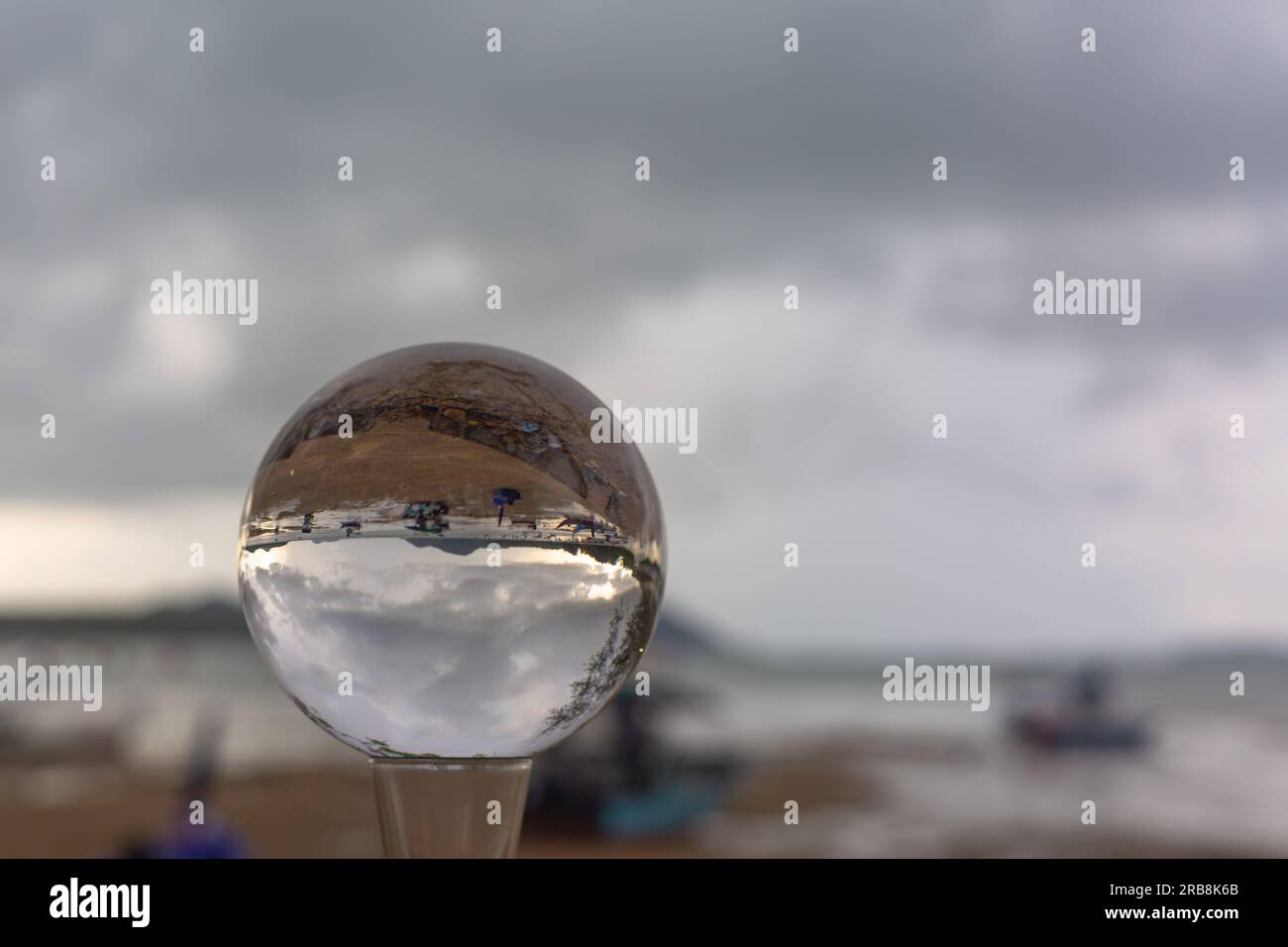 raining on crystal balls beside the beach. Nature image raining ...