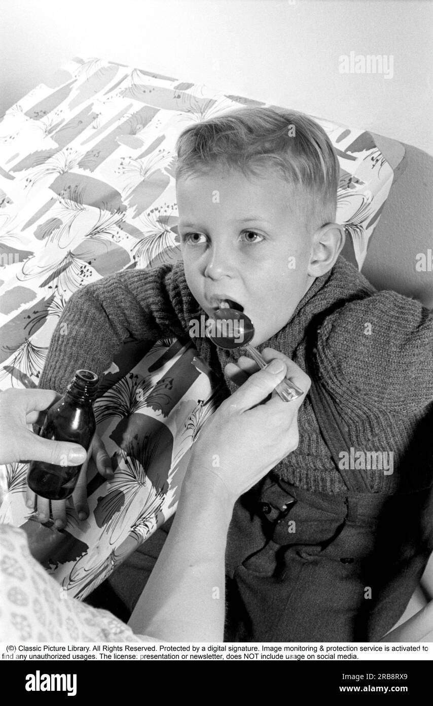 Sick boy 1950s hi-res stock photography and images - Alamy