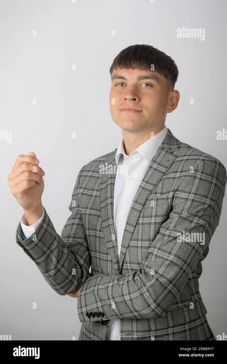 Young entrepreneur wearing a suit jacket and open neck shirt without a ...