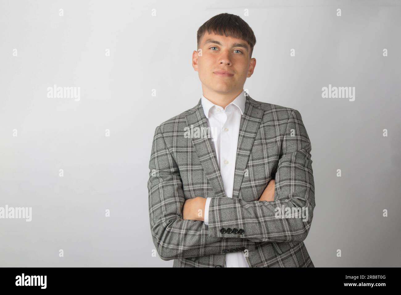 Young entrepreneur wearing a suit jacket and open neck shirt without a ...