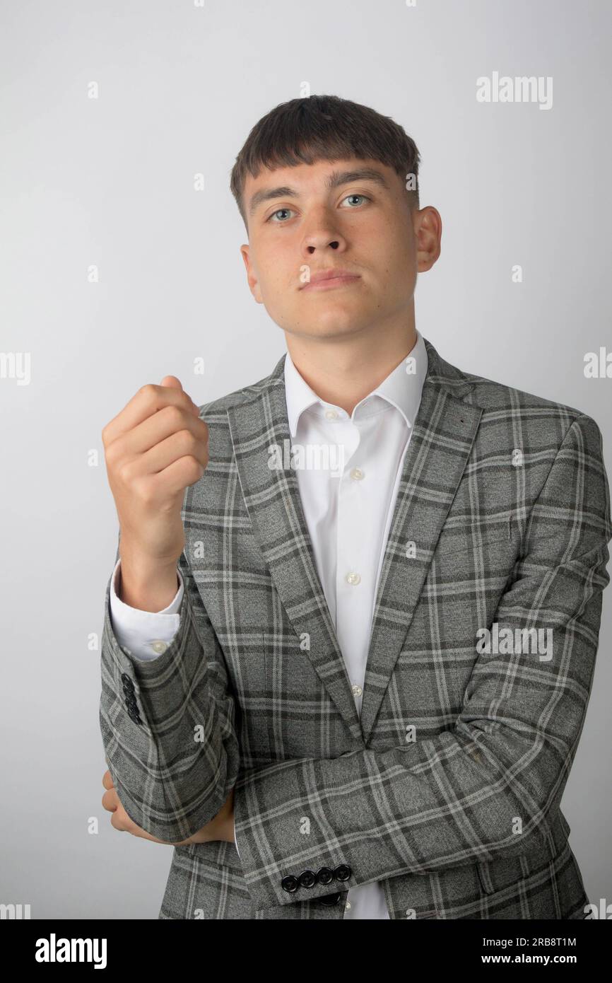 Young entrepreneur wearing a suit jacket and open neck shirt without a ...