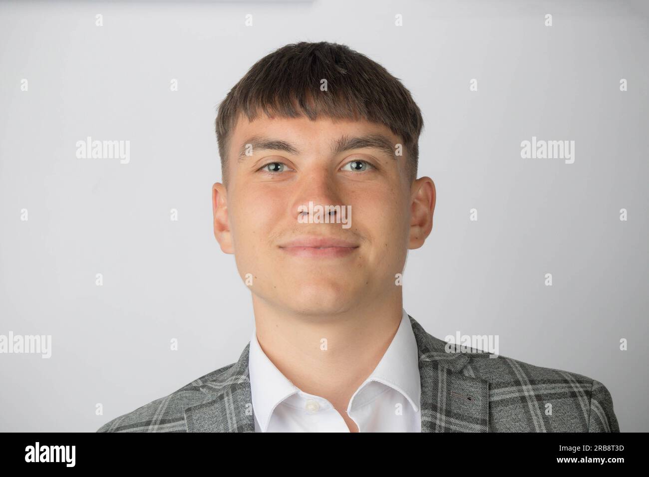 Young entrepreneur wearing a suit jacket and open neck shirt without a ...