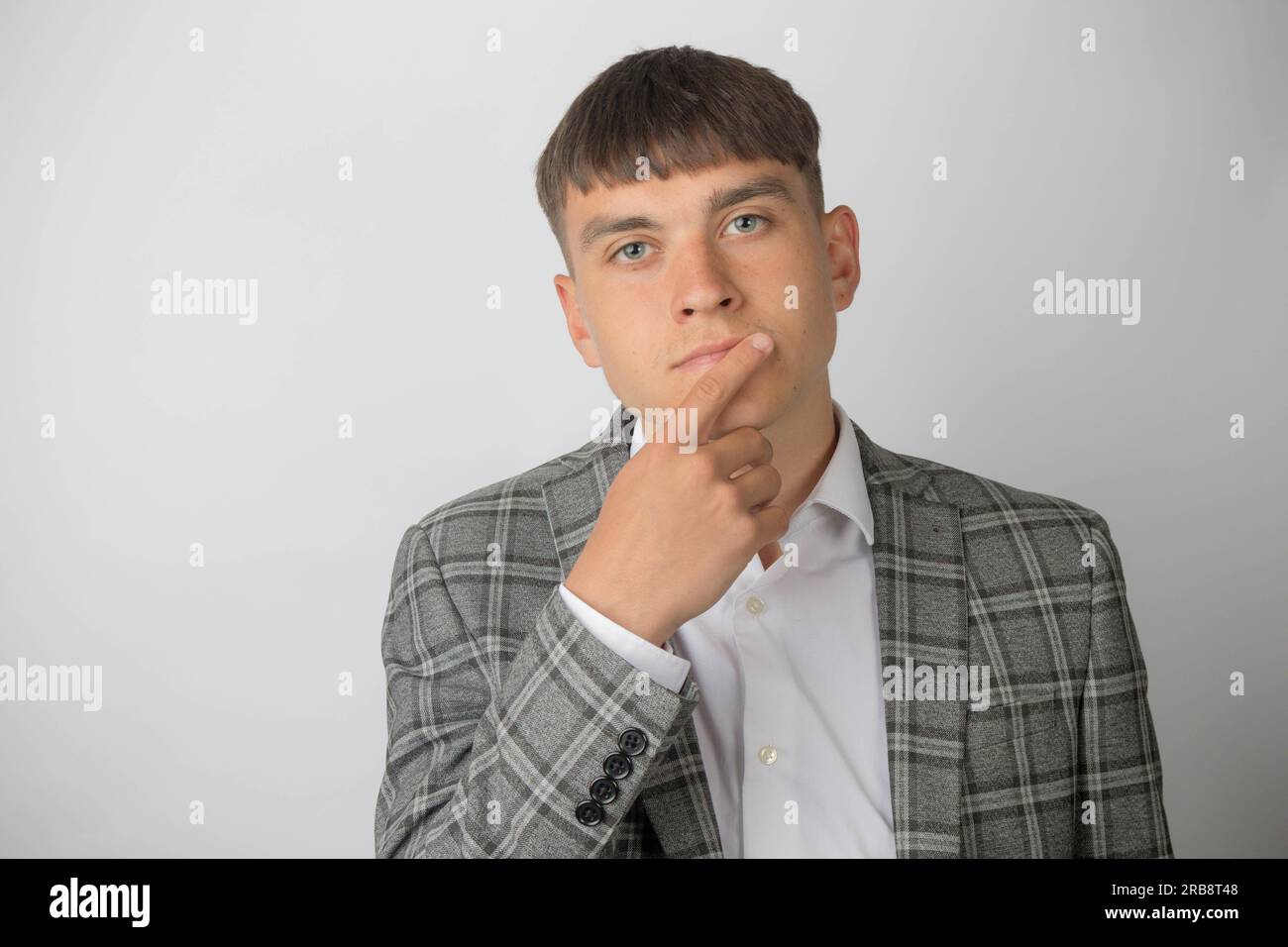 Young entrepreneur wearing a suit jacket and open neck shirt without a ...