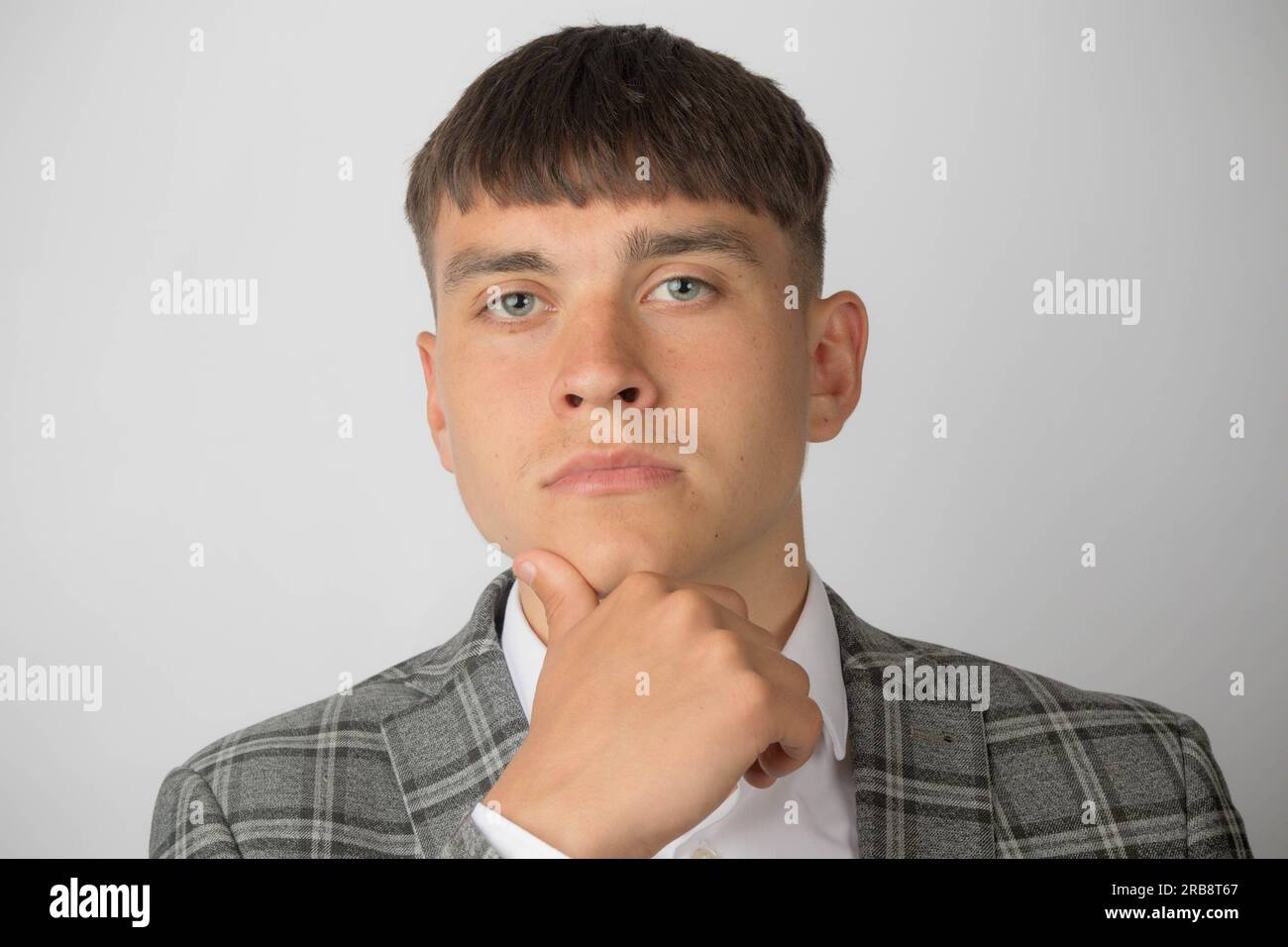Young entrepreneur wearing a suit jacket and open neck shirt without a ...