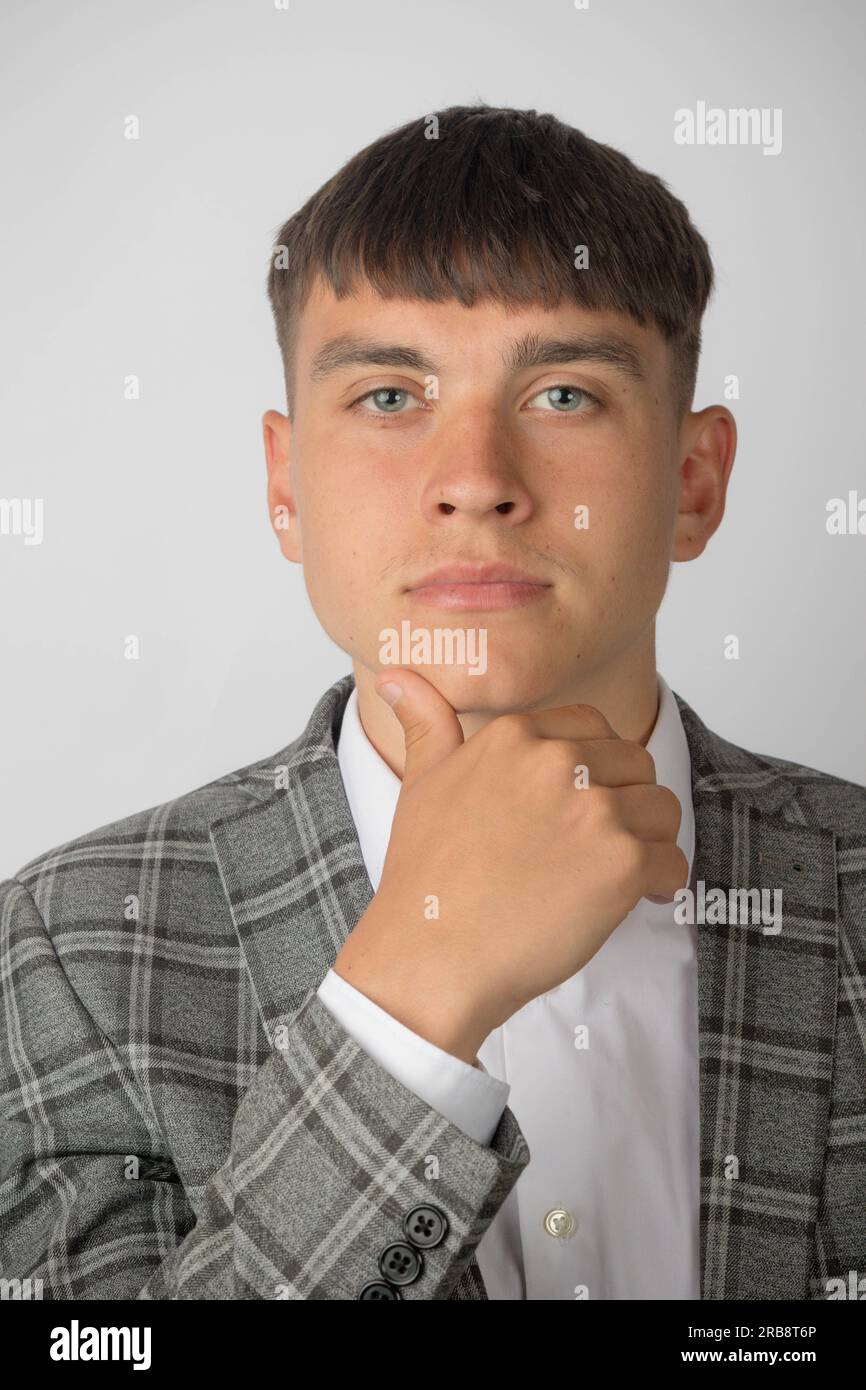 Young entrepreneur wearing a suit jacket and open neck shirt without a ...