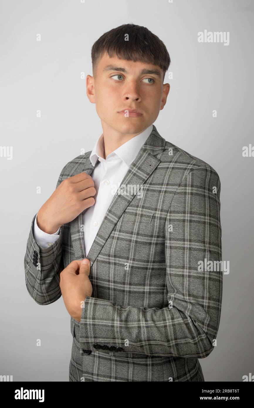 Young entrepreneur wearing a suit jacket and open neck shirt without a ...